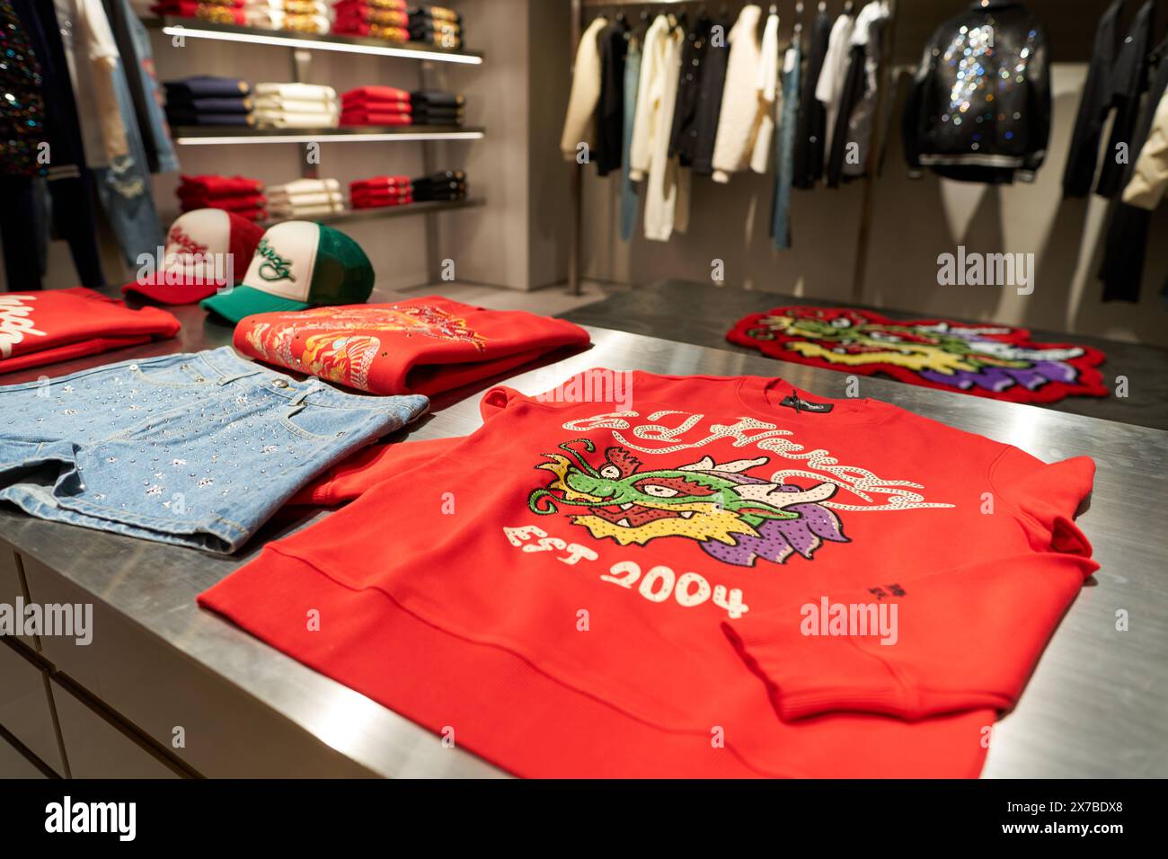 HONG KONG, CHINA - DECEMBER 05, 2023: various apparel displayed inside ...