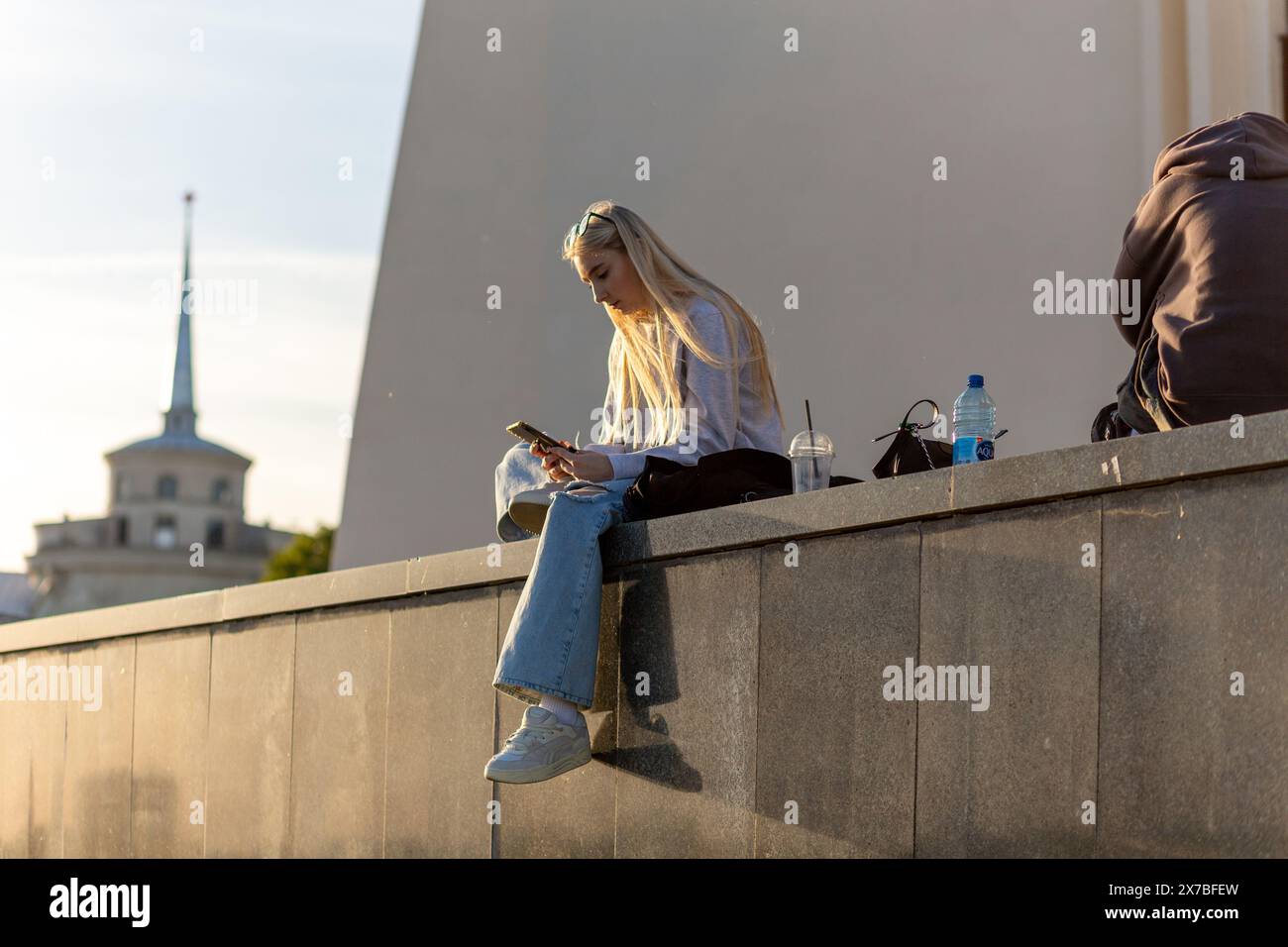 Sit on parapet hi-res stock photography and images - Alamy