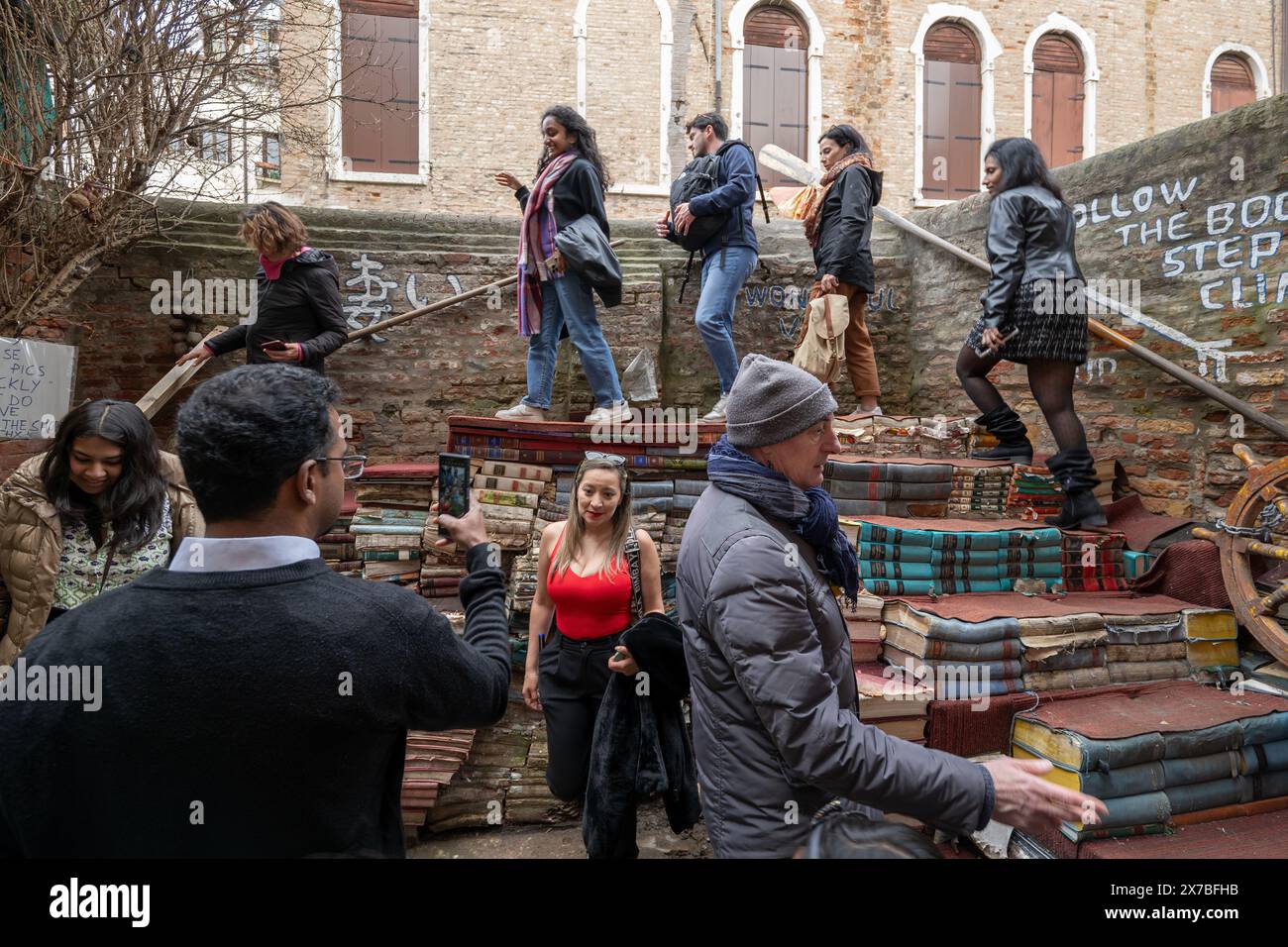 Acqua Alta Library, famous bookstore in city of Venice, Italy. People ...