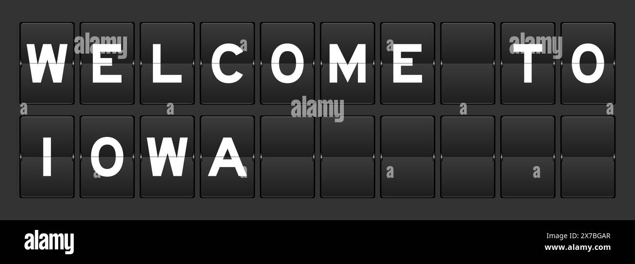 Black color analog flip board with word welcome to iowa on gray ...