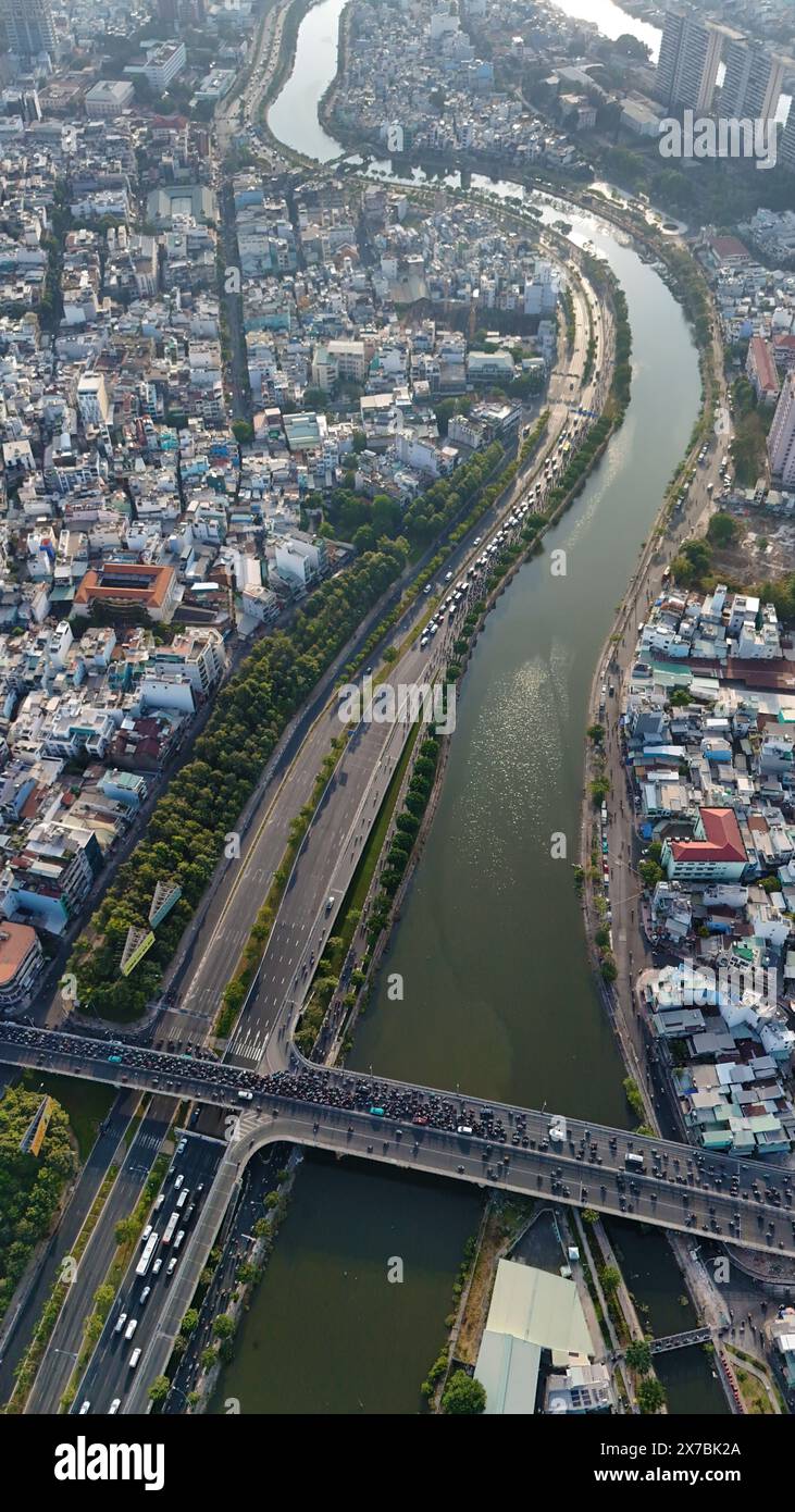 Ho chi Minh city aerial view with canal system, overcrowded riverside ...