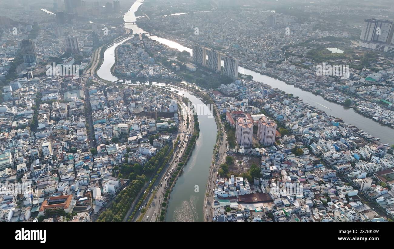 Ho chi Minh city aerial view with canal system, overcrowded riverside ...