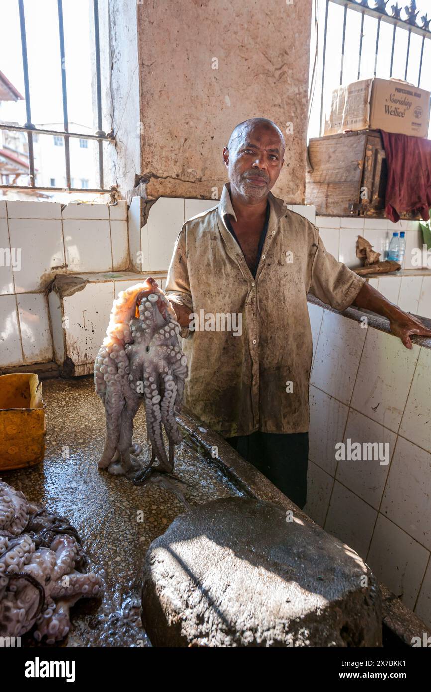 Tanzania, Zanzibar, Stone Town, Fishmonger with big octopus Stock Photo ...