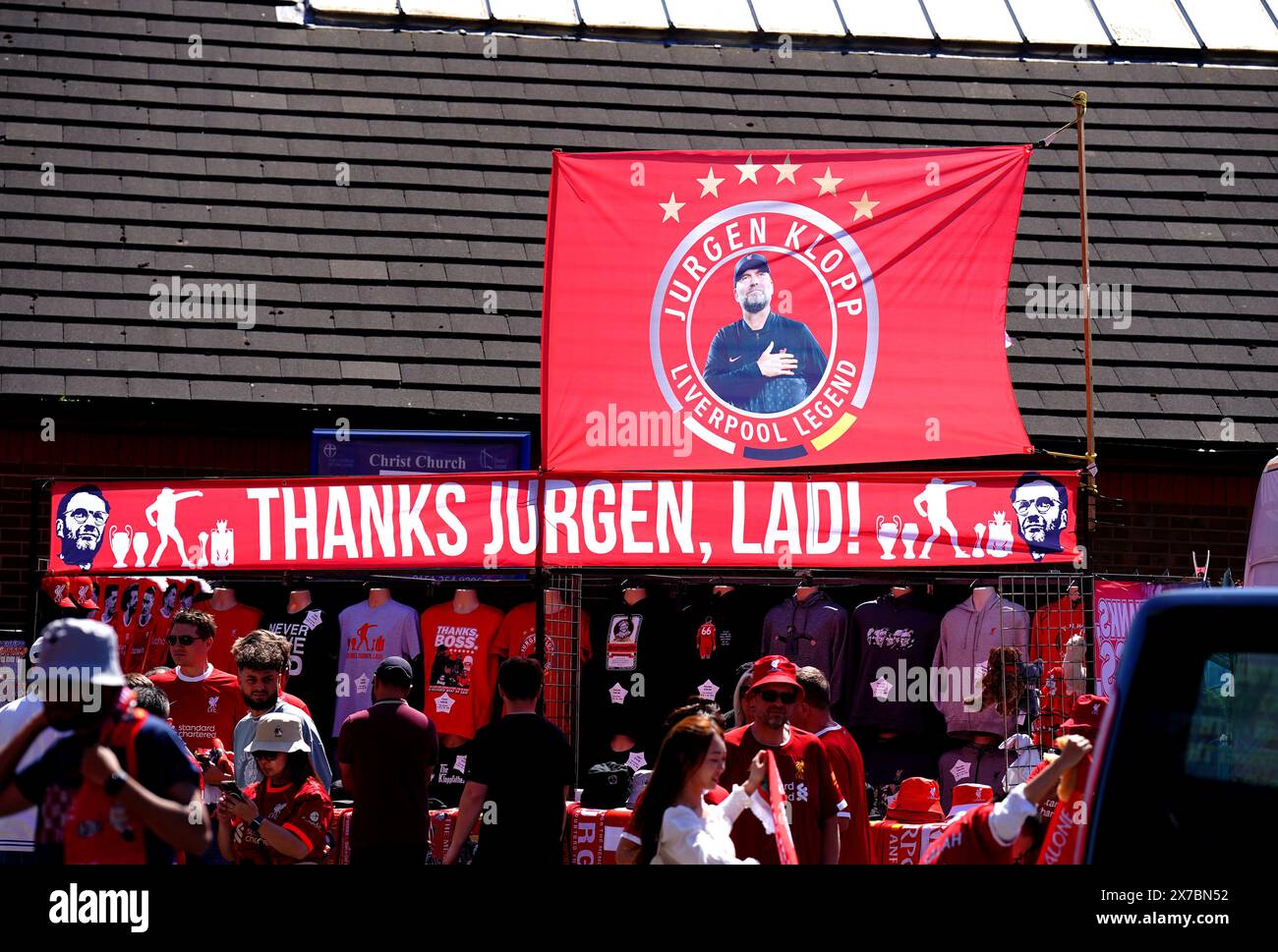 A street vendor stall decorated with banners in honour of Liverpool ...