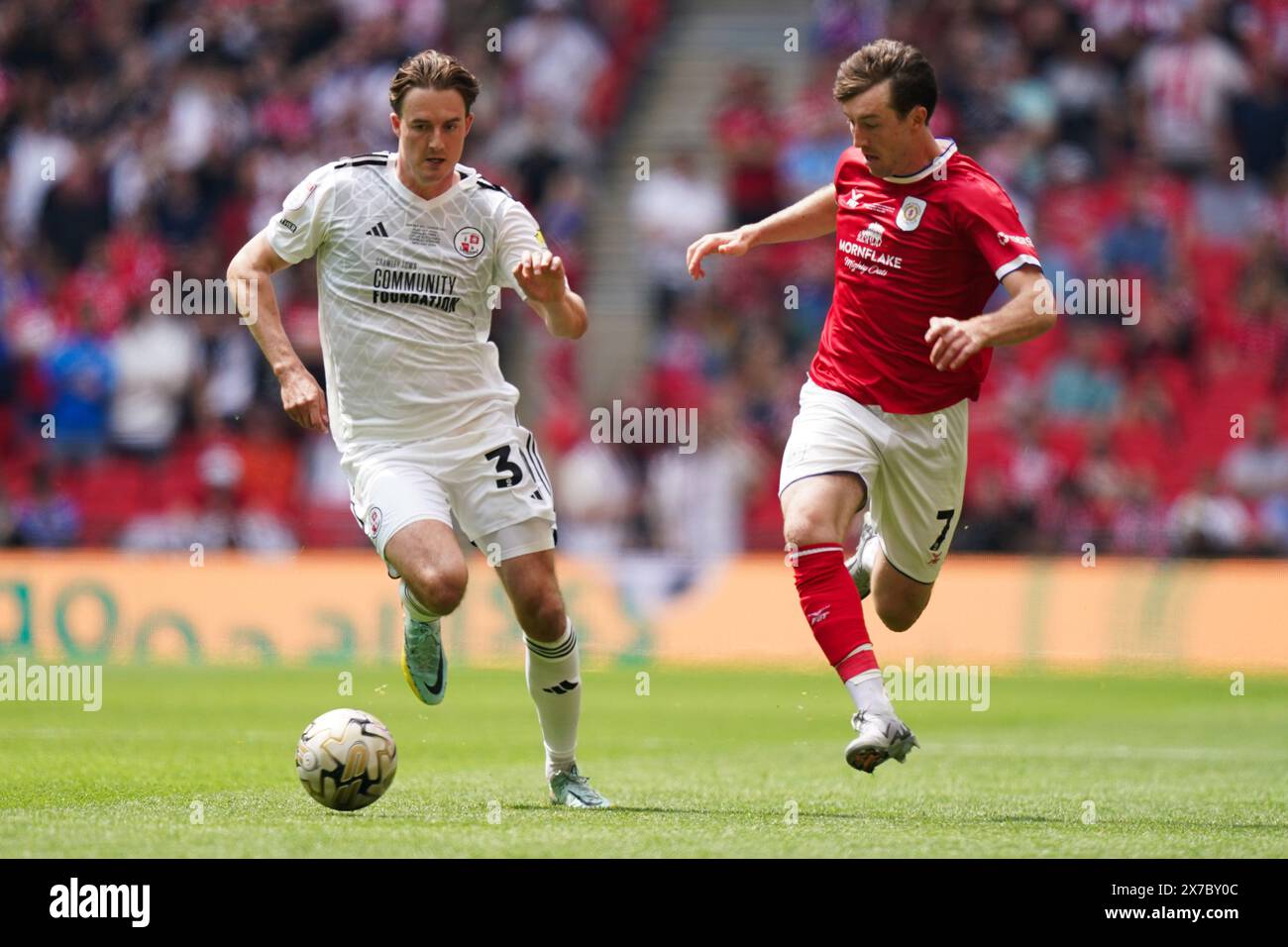 London, UK. 19th May, 2024. Will Wright of Crawley Town and Chris Long ...