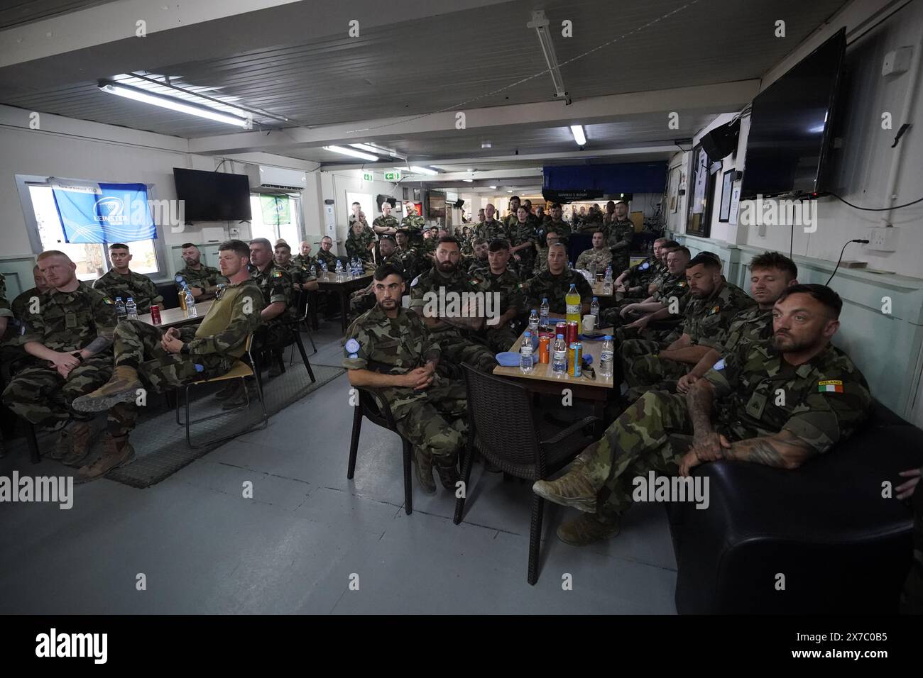Soldiers listening to Tanaiste Micheal Martin as he speaks to members ...