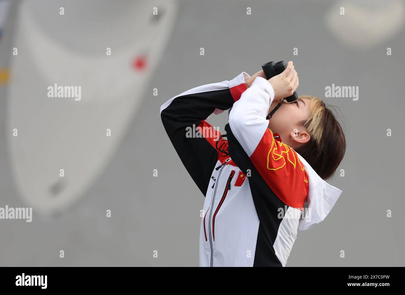 Shanghai. 19th May, 2024. Luo Zhilu of China checks the route during ...