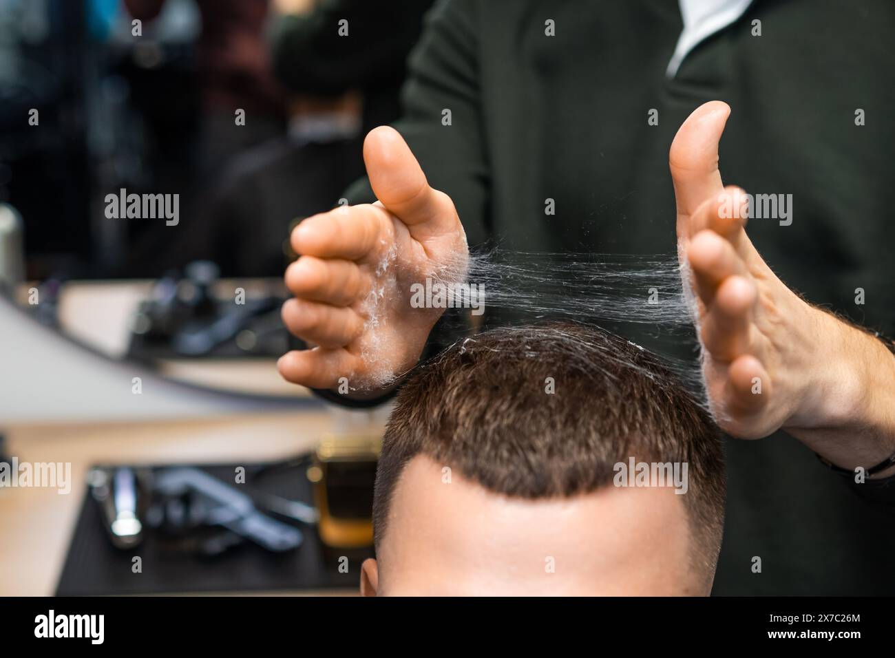 Barber expertly styling clients hi-res stock photography and images - Alamy