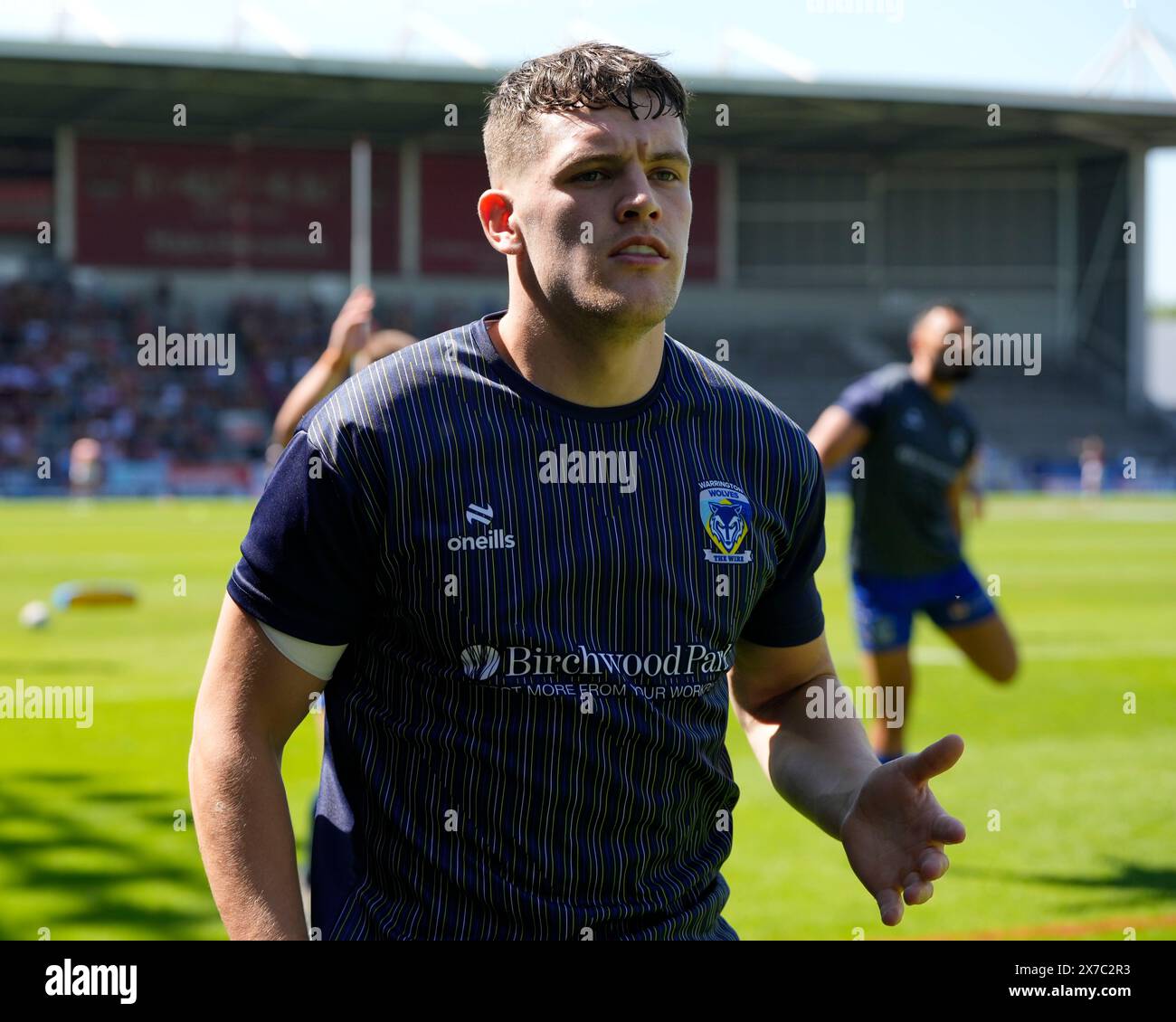 Josh Thewlis of Warrington Wolves warms up before the Betfred Challenge ...