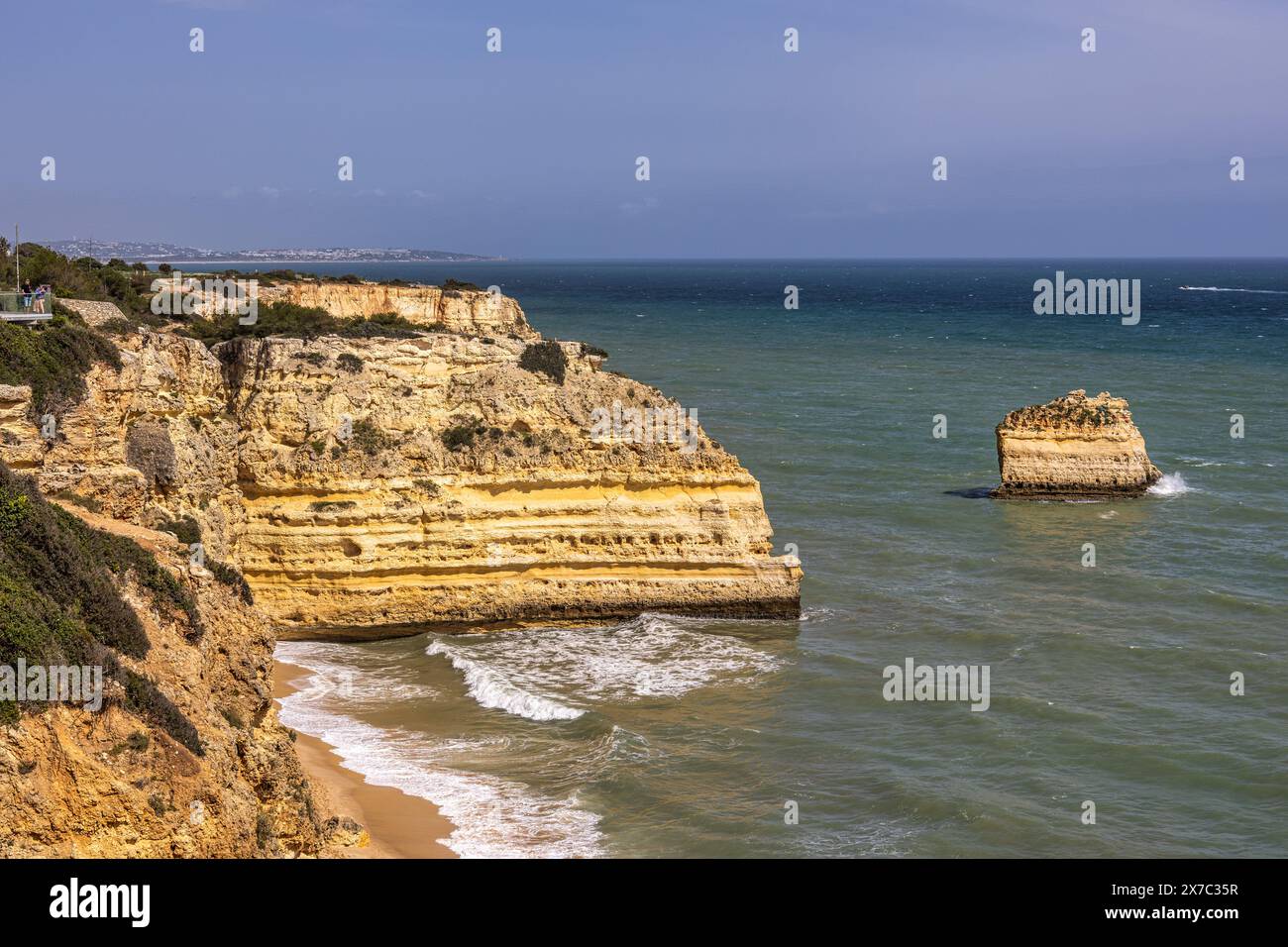 Praia da Marinha Beach among rock islets and cliffs seen from Seven ...
