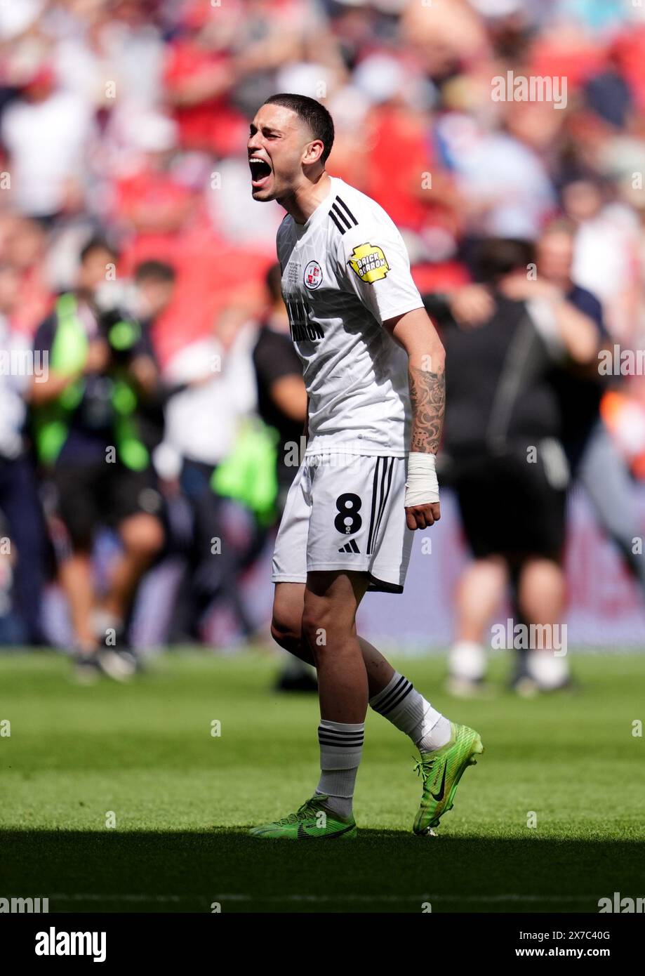 Crawley Town's Klaidi Lolos celebrates after the Sky Bet League Two ...