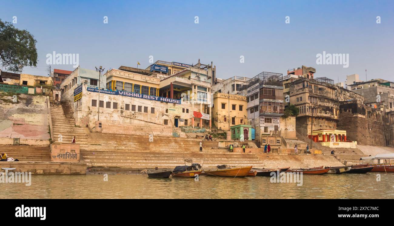 Panorama of boats and historic buildings at the Babua Pandey Ghat in ...