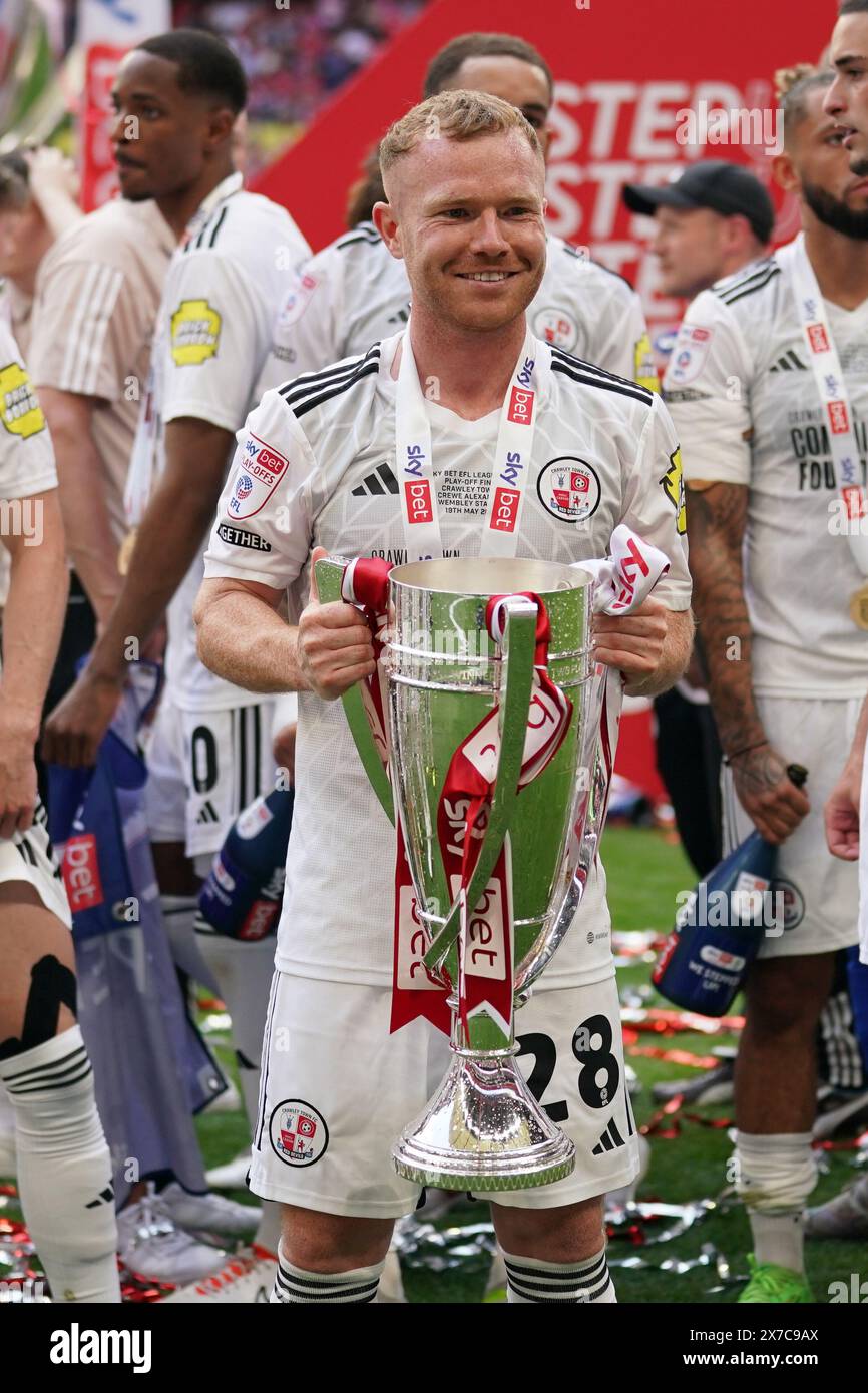 London, UK. 19th May, 2024. Adam Campbell of Crawley Town with the ...