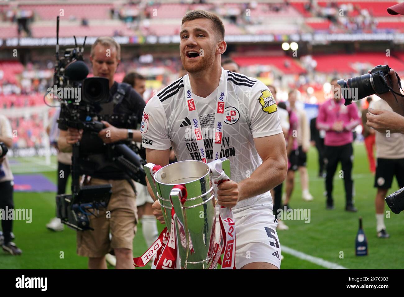 London, UK. 19th May, 2024. Harry Ransom of Crawley Town with the ...