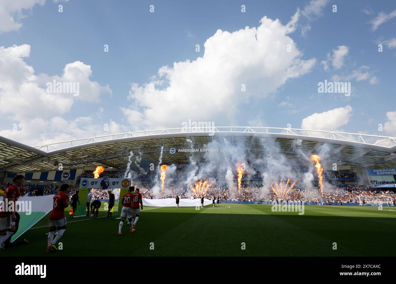 Manchester United's players walk out as pyrotechnics are set off before ...
