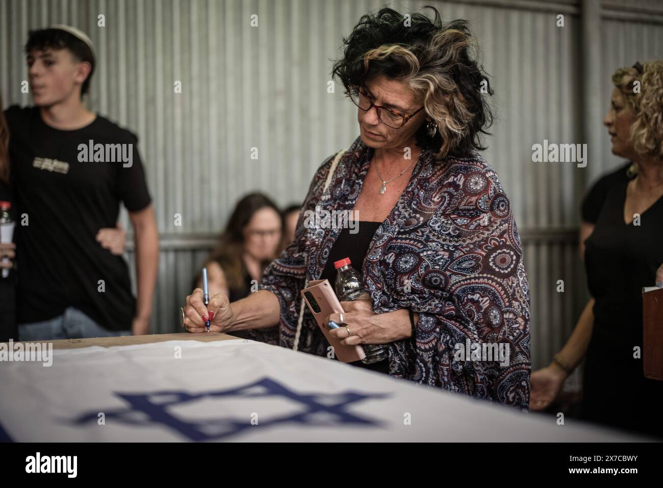 19 May 2024, Israel, Srigim-Li On: Relatives and friends write on the ...