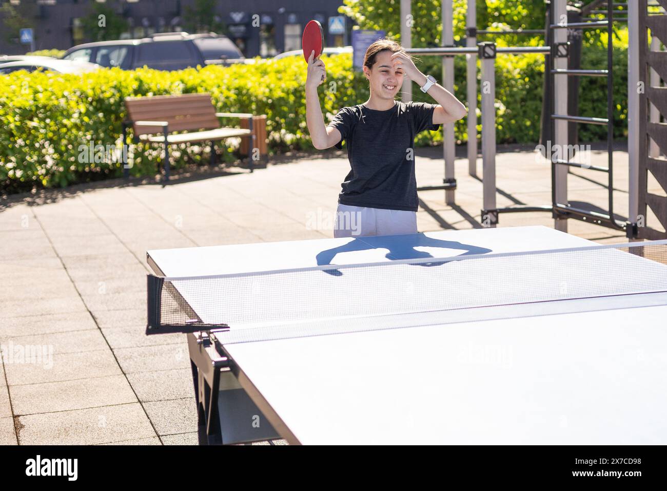 Cute girl playing table tennis hi-res stock photography and images - Alamy