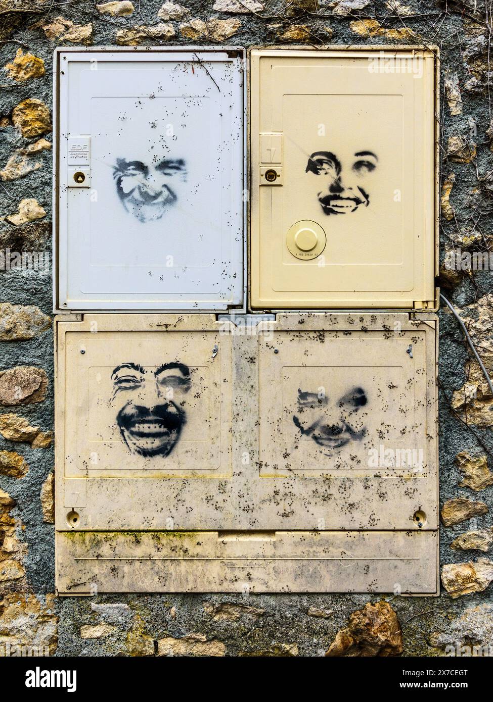 Stenciled faces on electricity meter boxes - Argenton-sur-Creuse, Indre ...