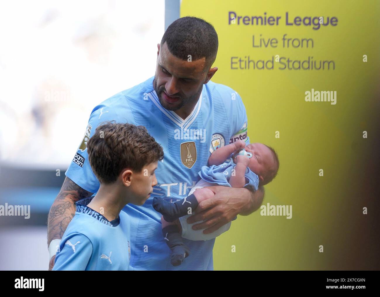 Manchester City's Kyle Walker and new born baby Rezon before the ...