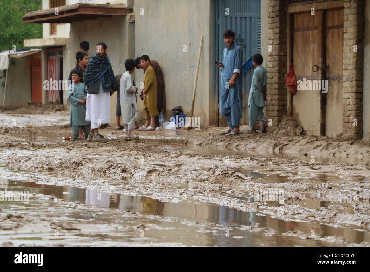 Faryab, Afghanistan's Faryab Province. 19th May, 2024. People stand by ...