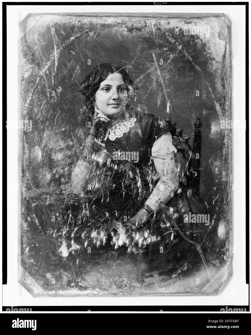 Unidentified woman, three-quarter length portrait facing slightly right, Hallmark: Rinhart 9 ...