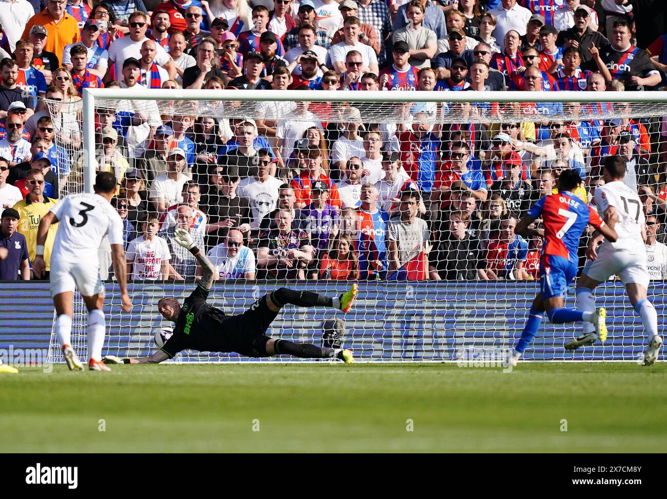 Aston Villa goalkeeper Robin Olsen attempts to save a shot on goal from ...