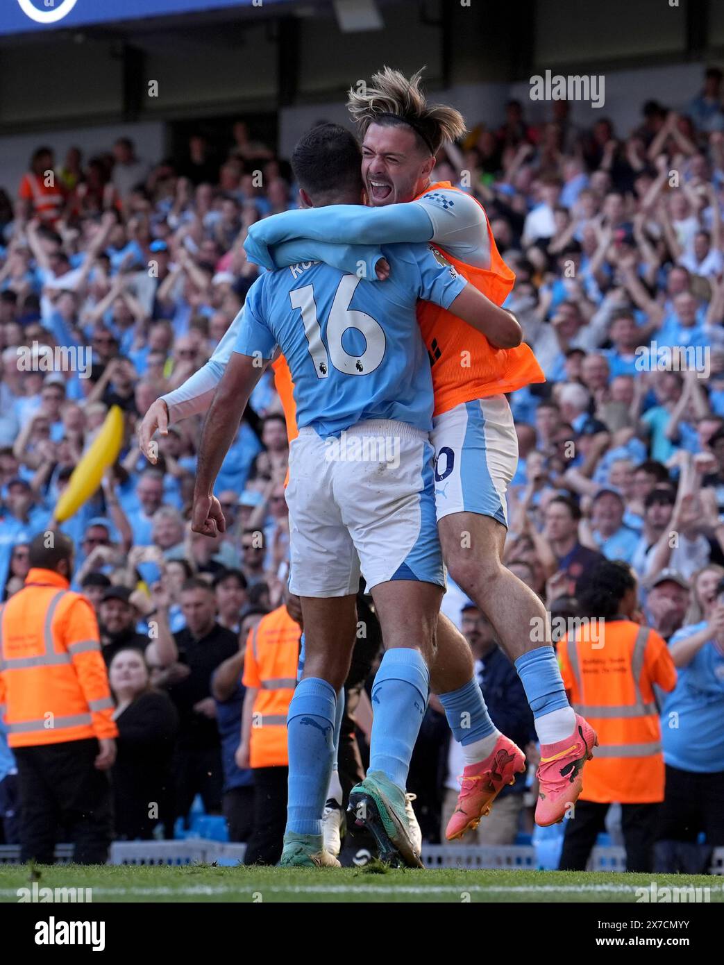 Manchester City's Rodri (left) celebrates with Jack Grealish after ...