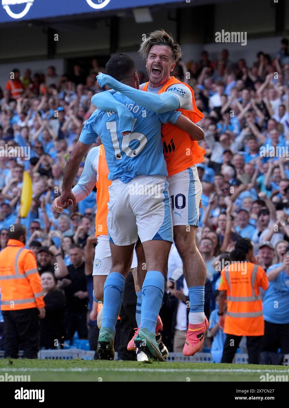 Manchester City's Rodri (left) celebrates with Jack Grealish after ...