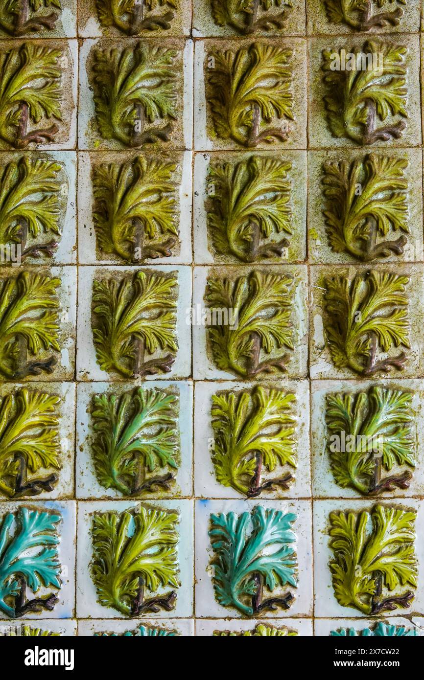 Geometric Moorish patterned tiles known as Azulejos, decorate the ...