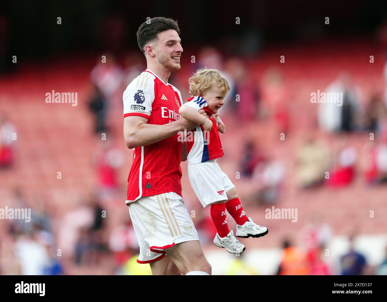 Arsenal's Declan Rice with his son, Jude, following the Premier League ...