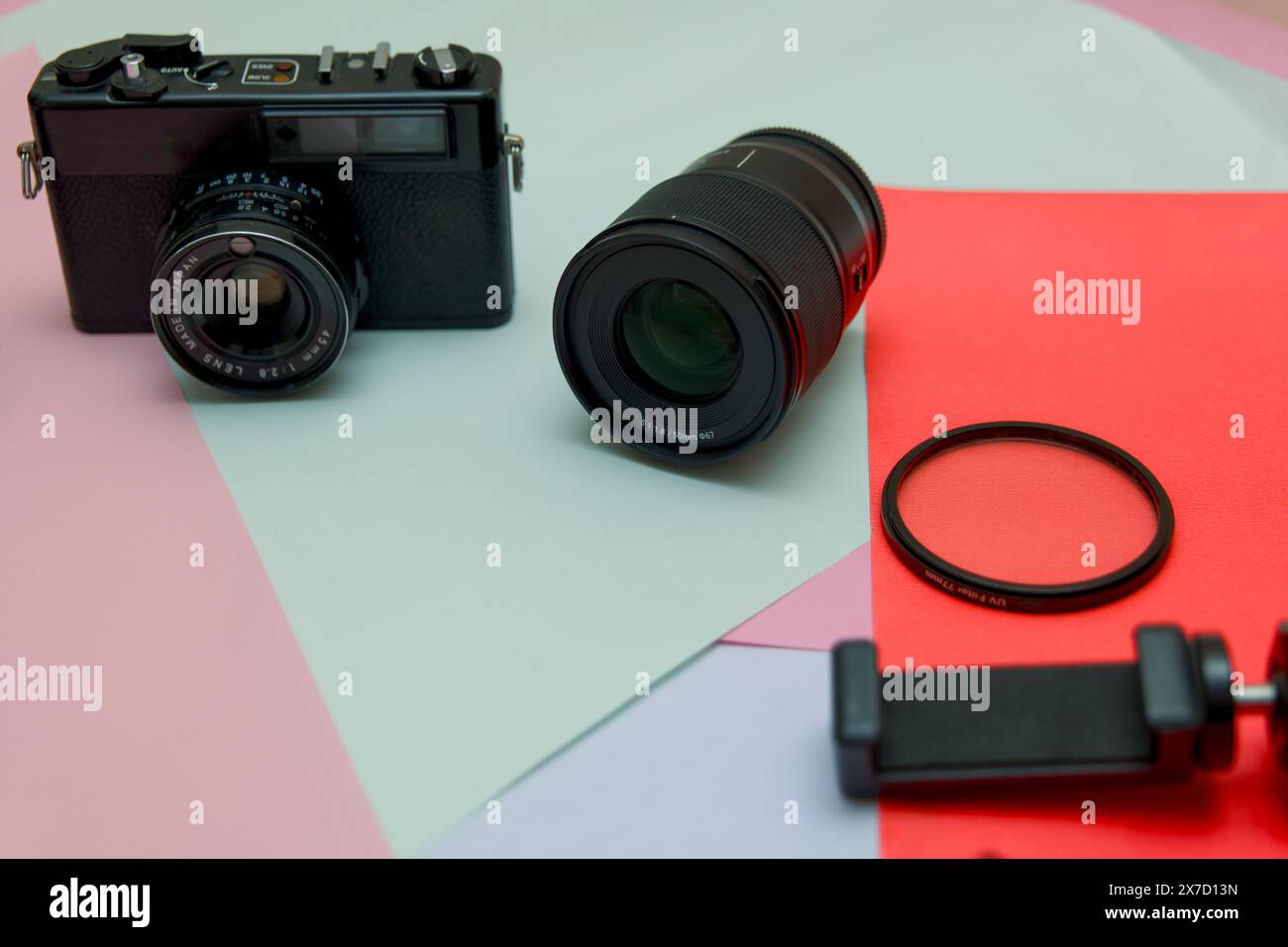 This image is about camera and flash on a colored background the ...