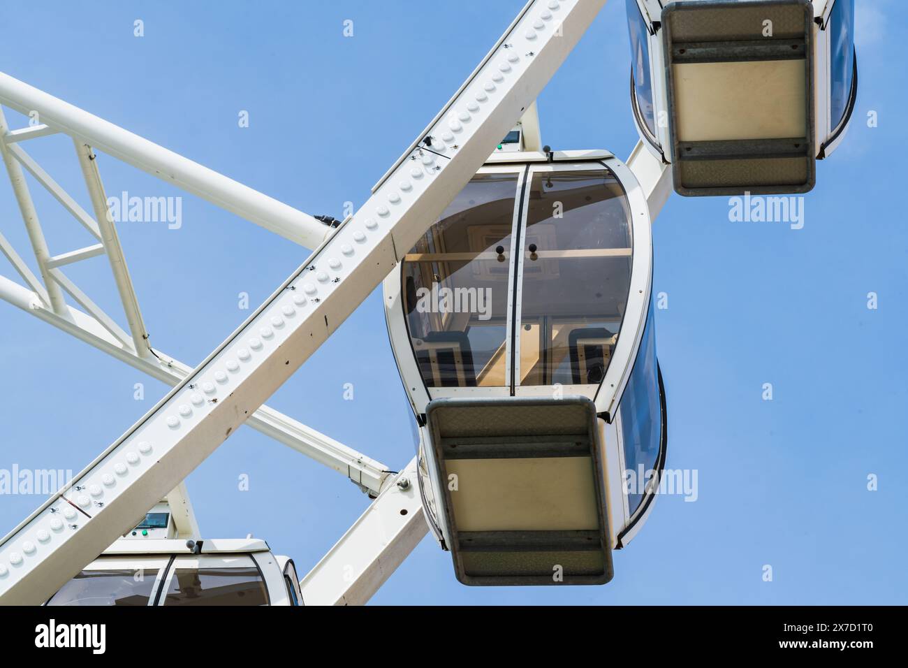 Closer detail of a Ferris wheel gondola cabin with a blue sky Stock ...