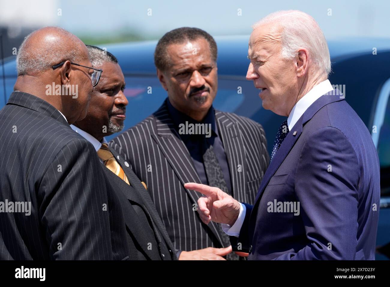 President Joe Biden, from right, is greeted by pastor Tellis Chapman ...