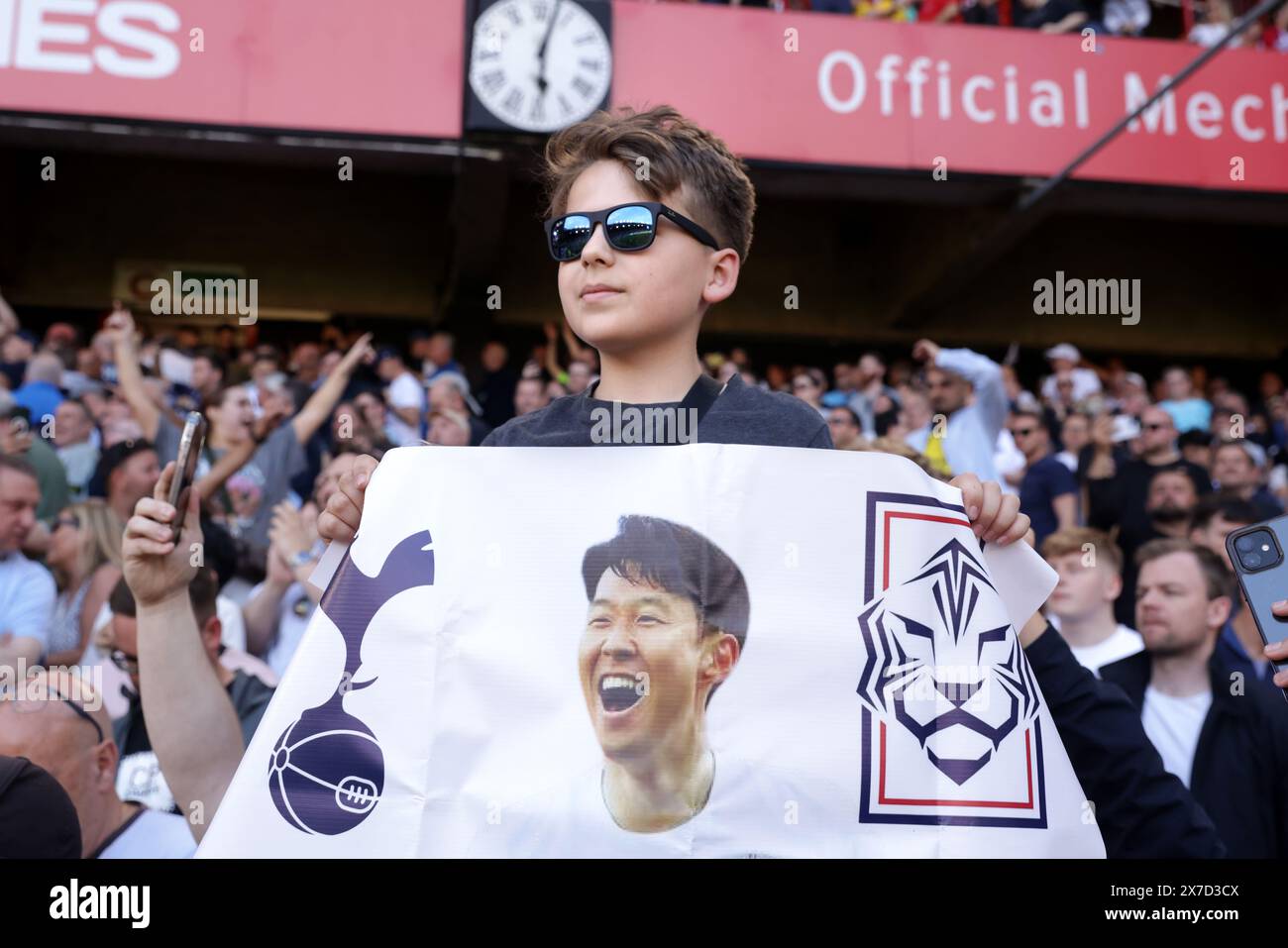 A young fan holds up a sign for Tottenham Hotspur's Son Heung-Min after ...