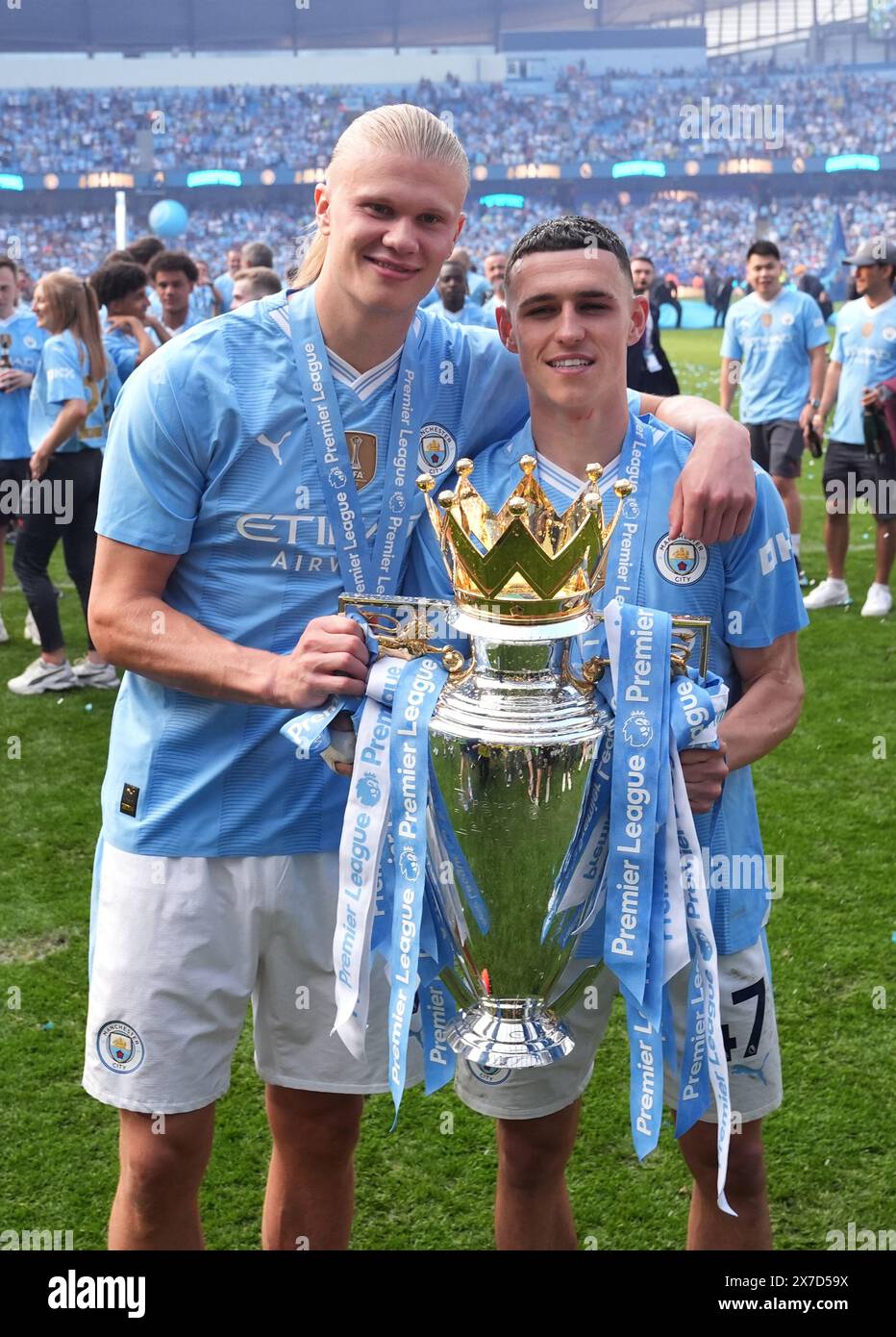Manchester City's Erling Haaland (left) and Phil Foden celebrate with ...