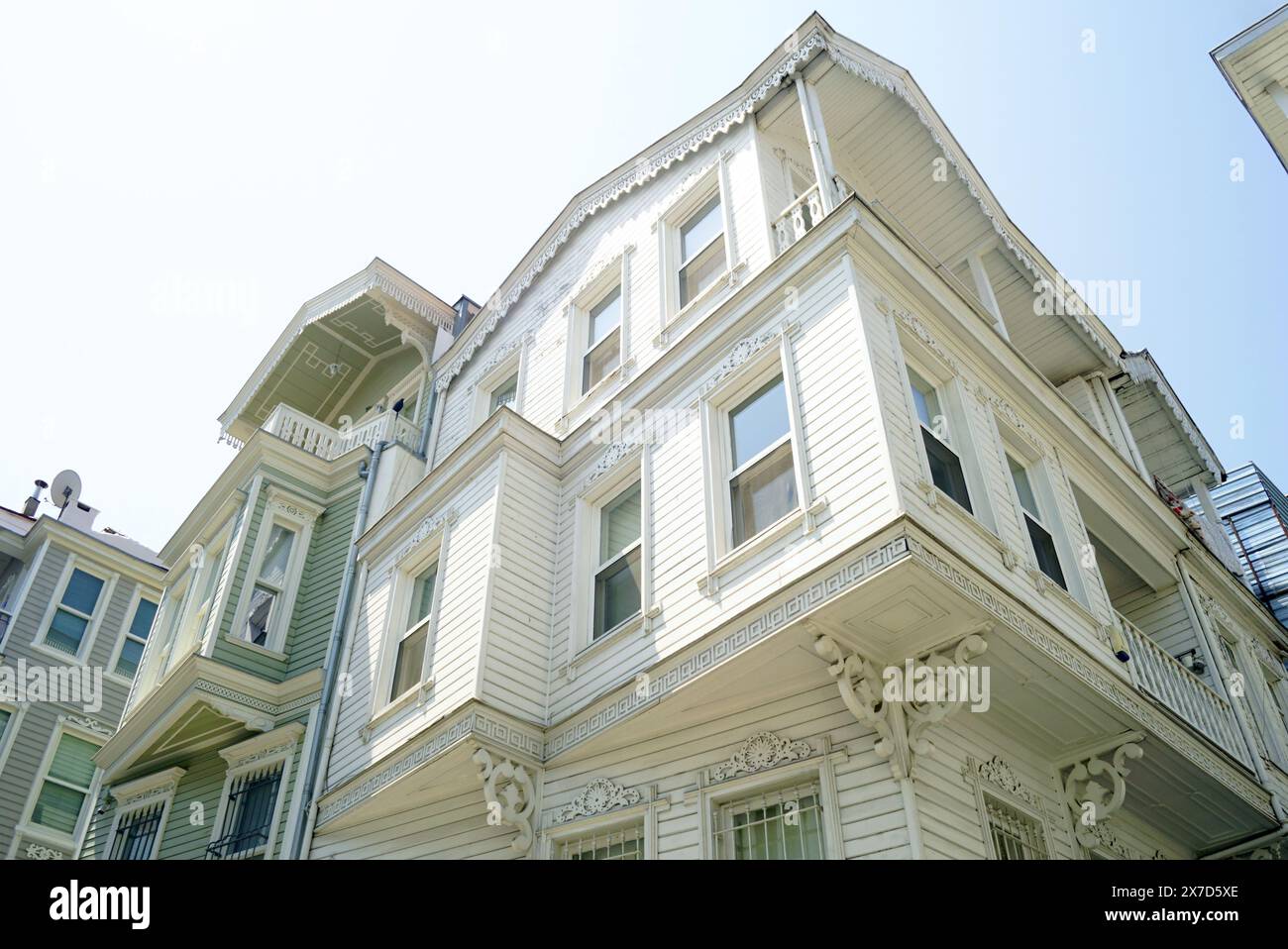 Bottom-up view of the old wooden houses of Istanbul. Street in ...