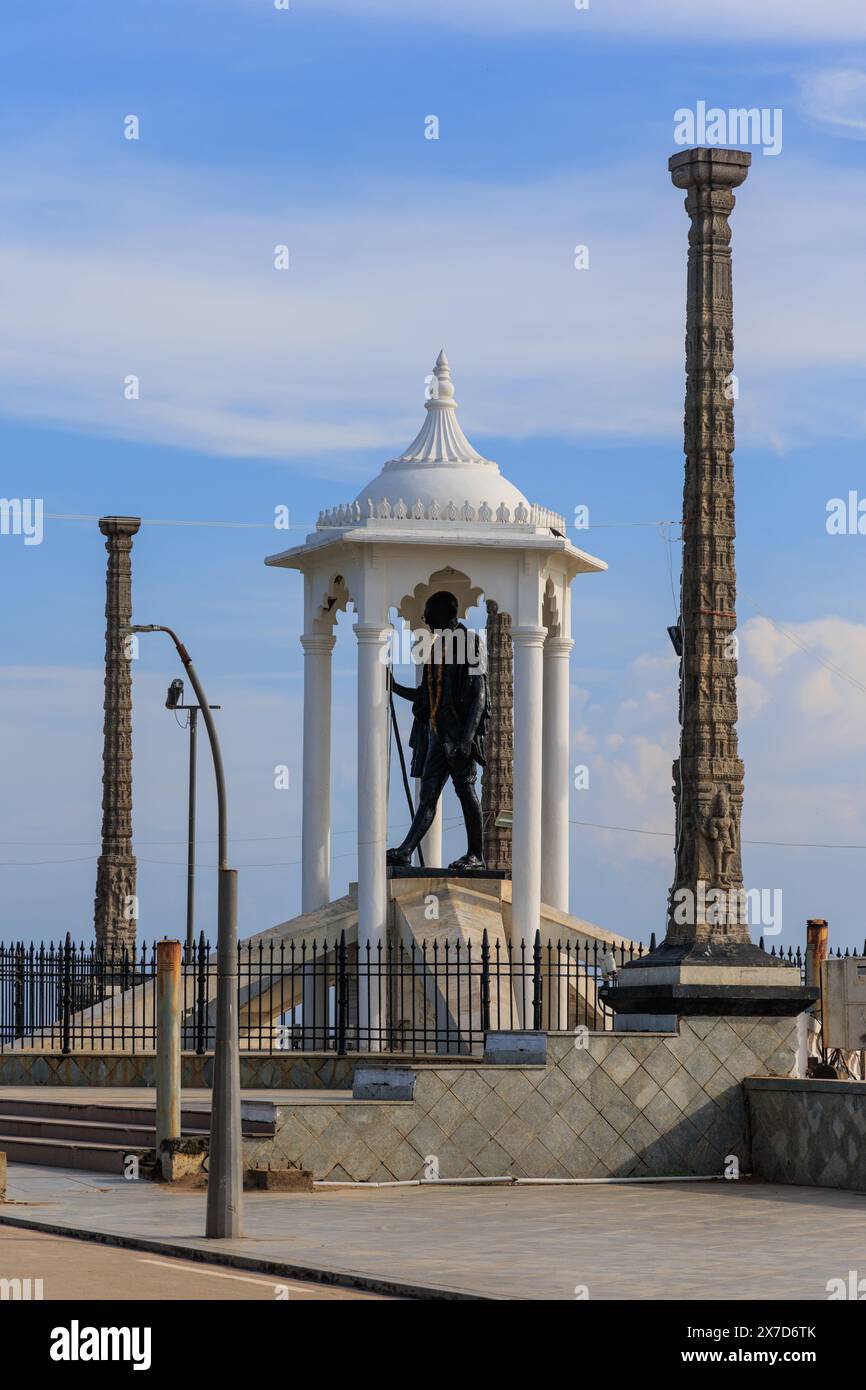View of the Mahatma Gandhi Bronze Statue surrounded by granite pillars ...