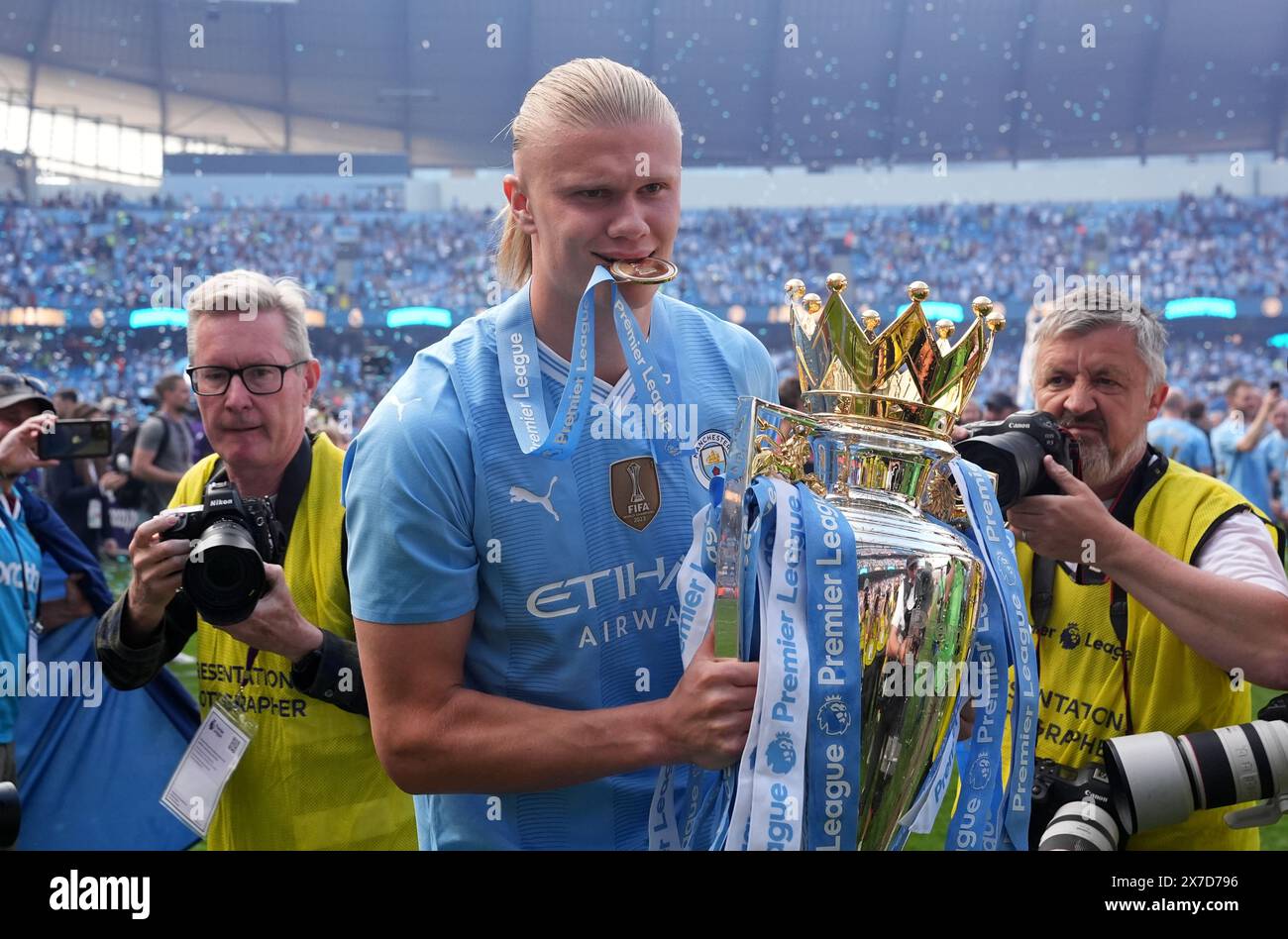 Manchester City's Erling Haaland celebrates with the Premier League ...