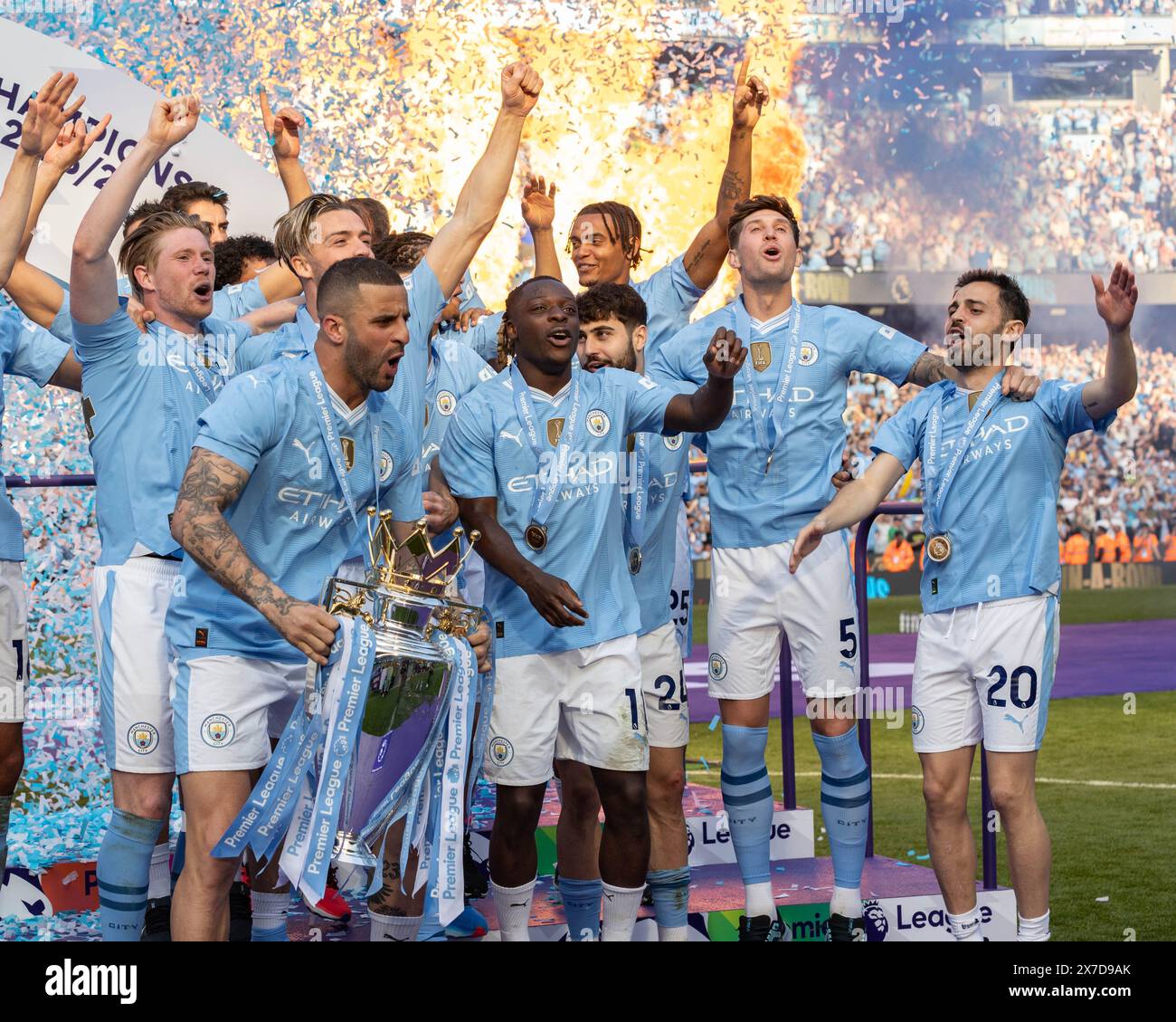 Kyle Walker of Manchester City lifts the Premier League Trophy with ...