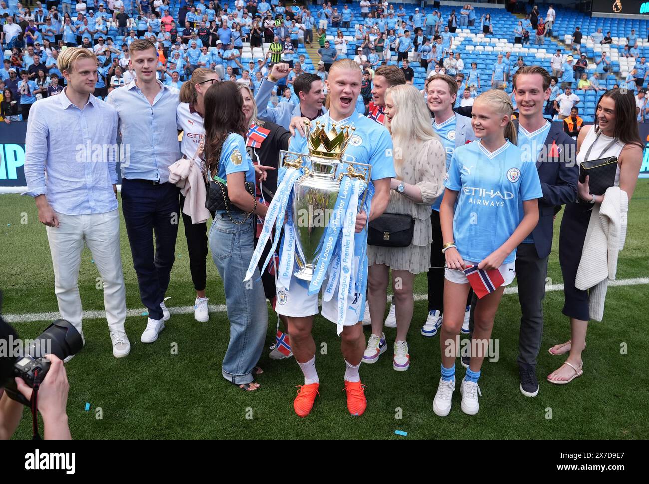 Manchester City's Erling Haaland celebrates with the Premier League ...