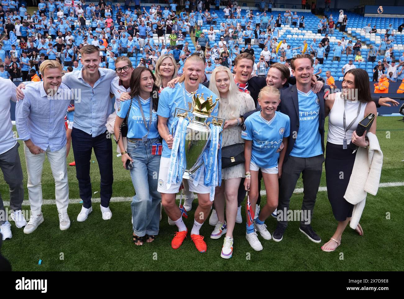 Manchester City's Erling Haaland celebrates with the Premier League ...