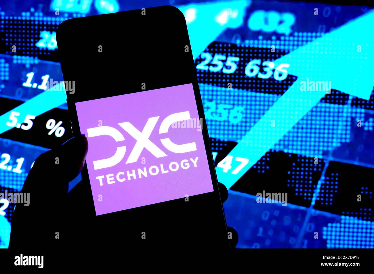 In this photo illustration, a DXC Technology logo seen displayed on a smartphone Stock Photo - Alamy