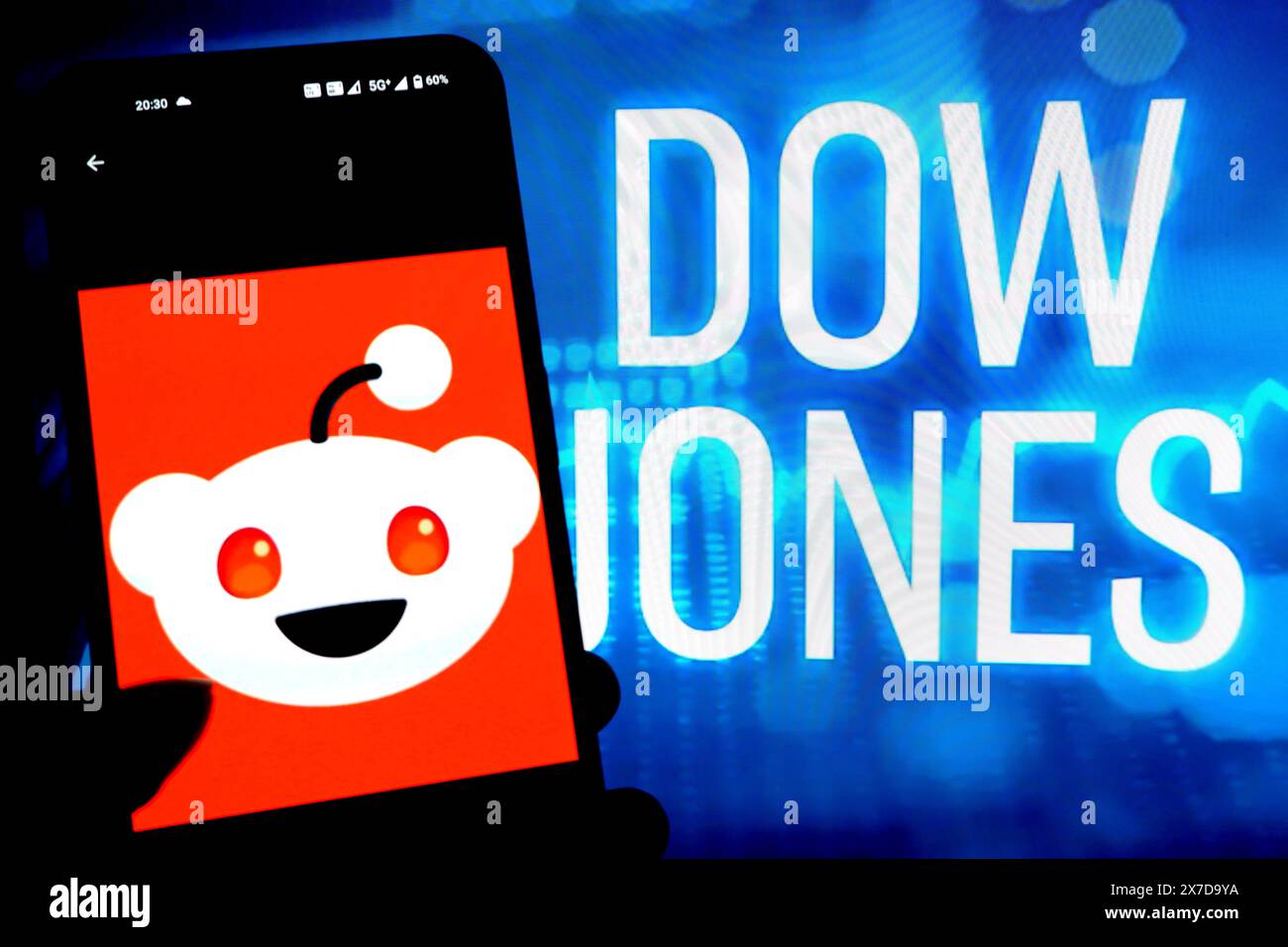 In this photo illustration, a Reddit logo seen displayed on a ...