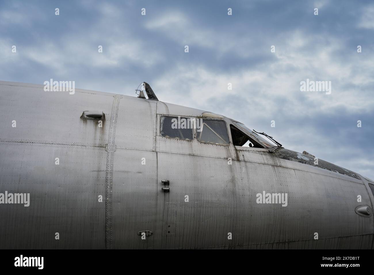 The front fuselage of an old An 12 military cargo aircraft Stock Photo ...