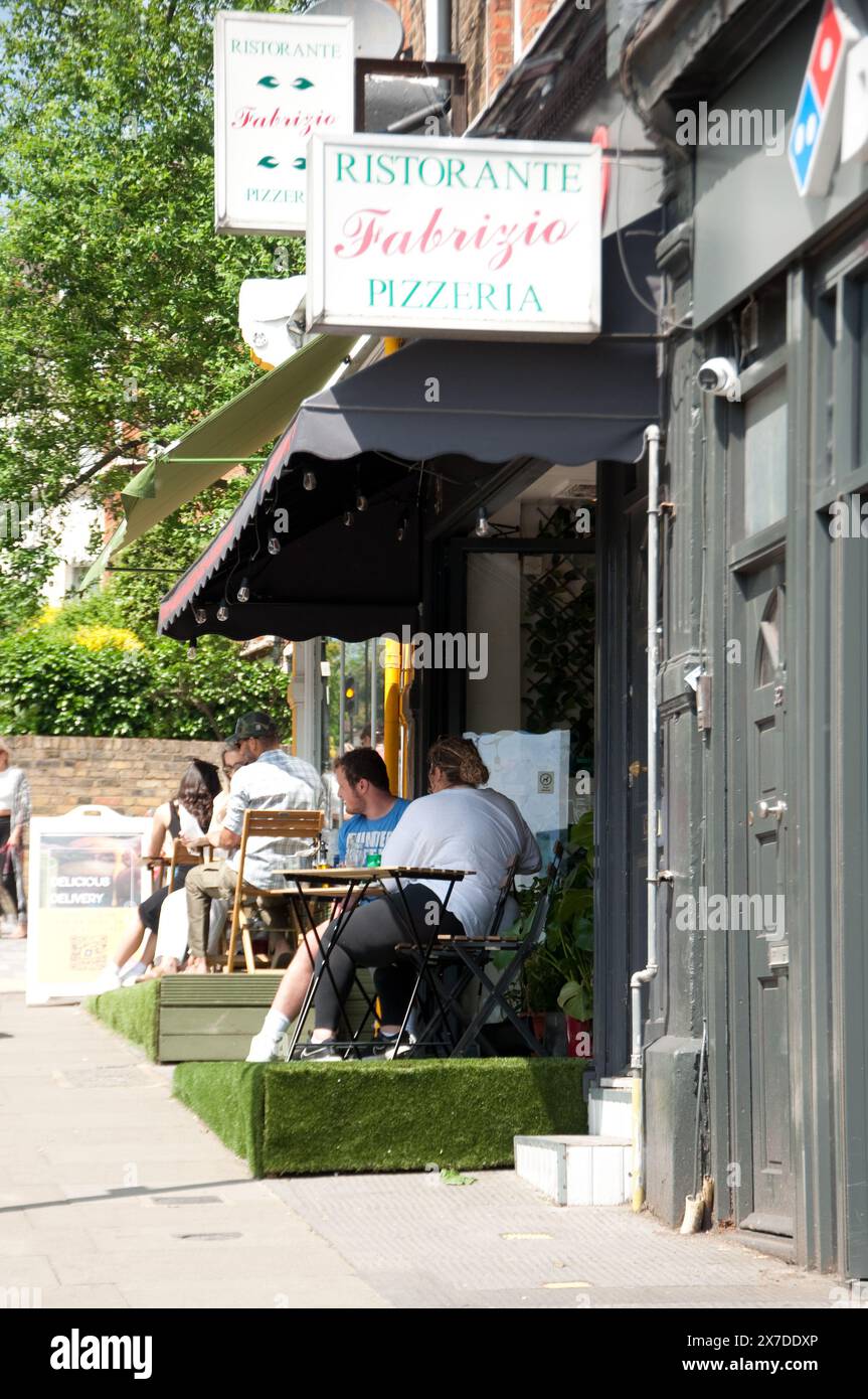 Eating "Al fresco", Highgate hill, Highgate Village, London, UK. People ...