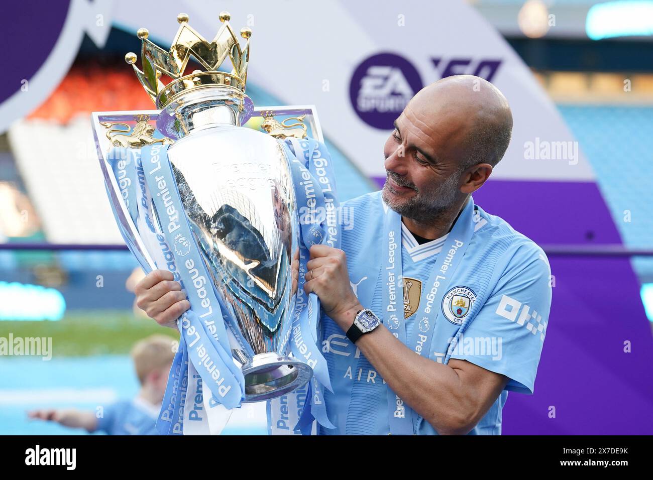 Manchester City manager Pep Guardiola with the Premier League trophy ...