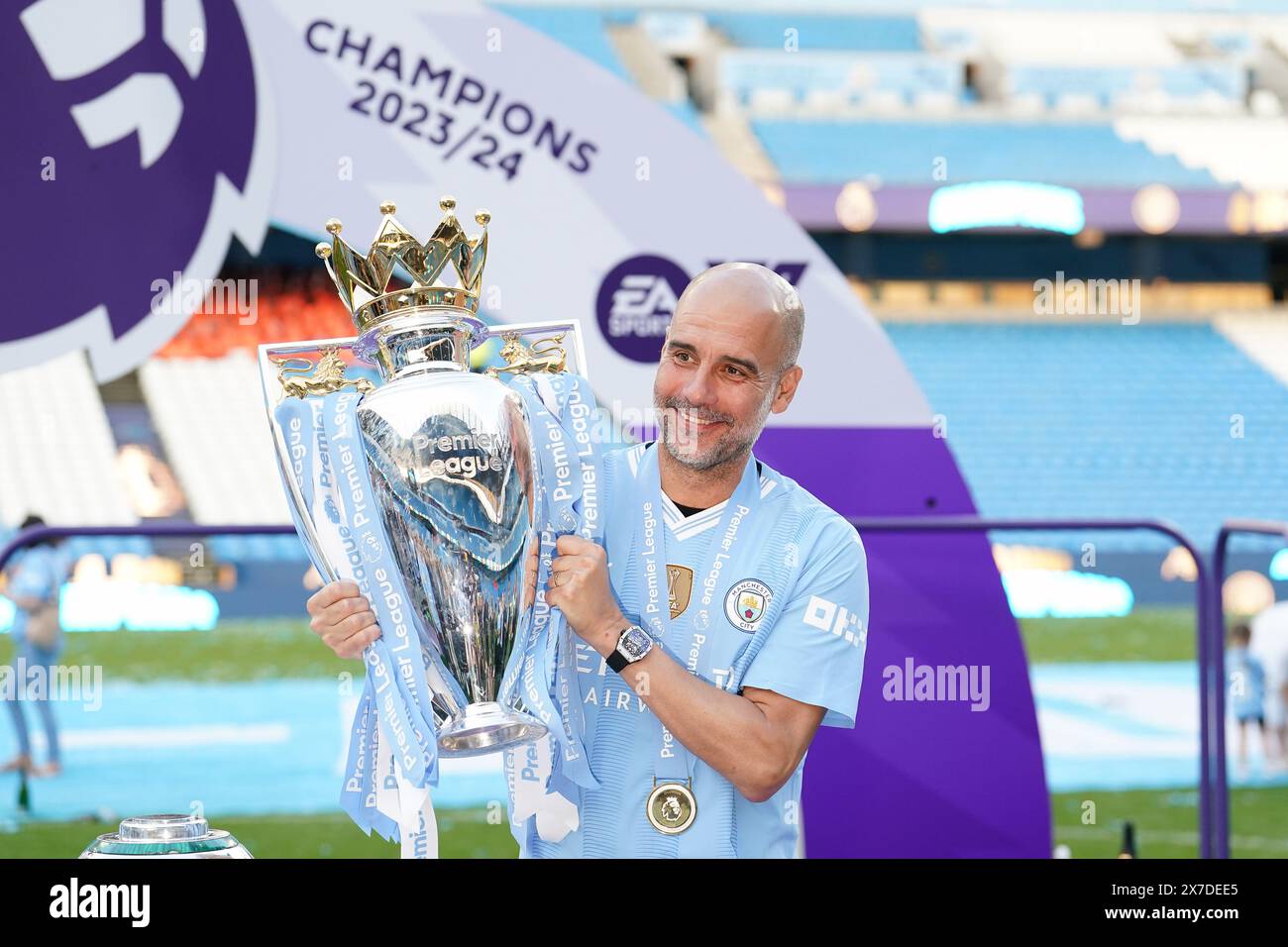 Manchester City manager Pep Guardiola with the Premier League trophy ...