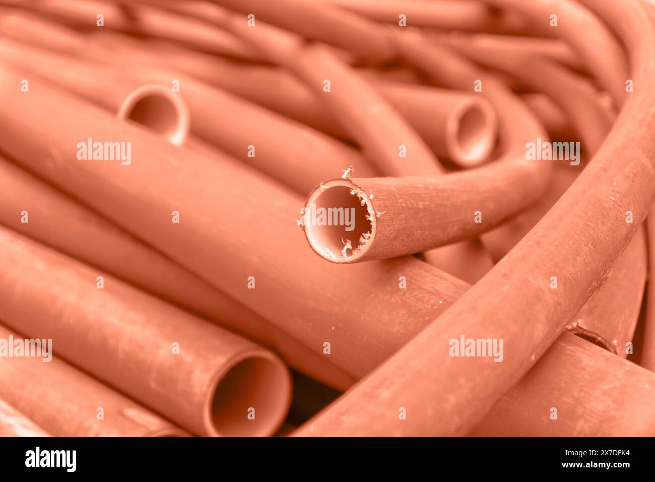 Mountain of Industrial pipes toned in peach fuzz - the fashionable ...