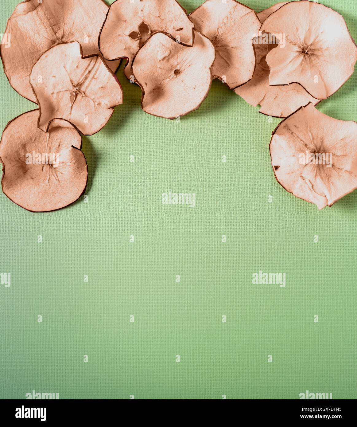 dried apples chips toned in peach fuzz color - trendy color of 2024 ...