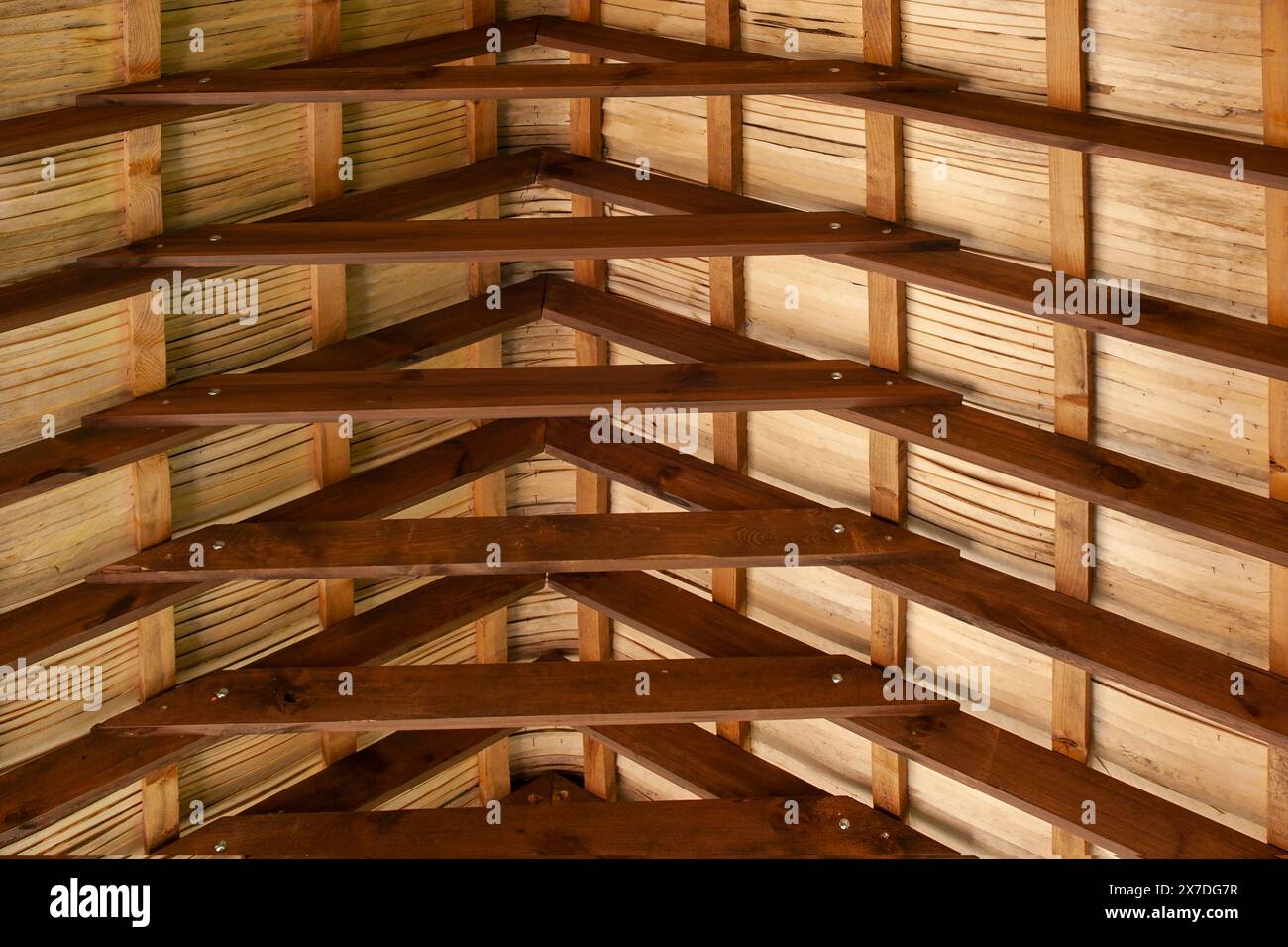 Wooden roof structure with an abstract appearance, carpentry ...